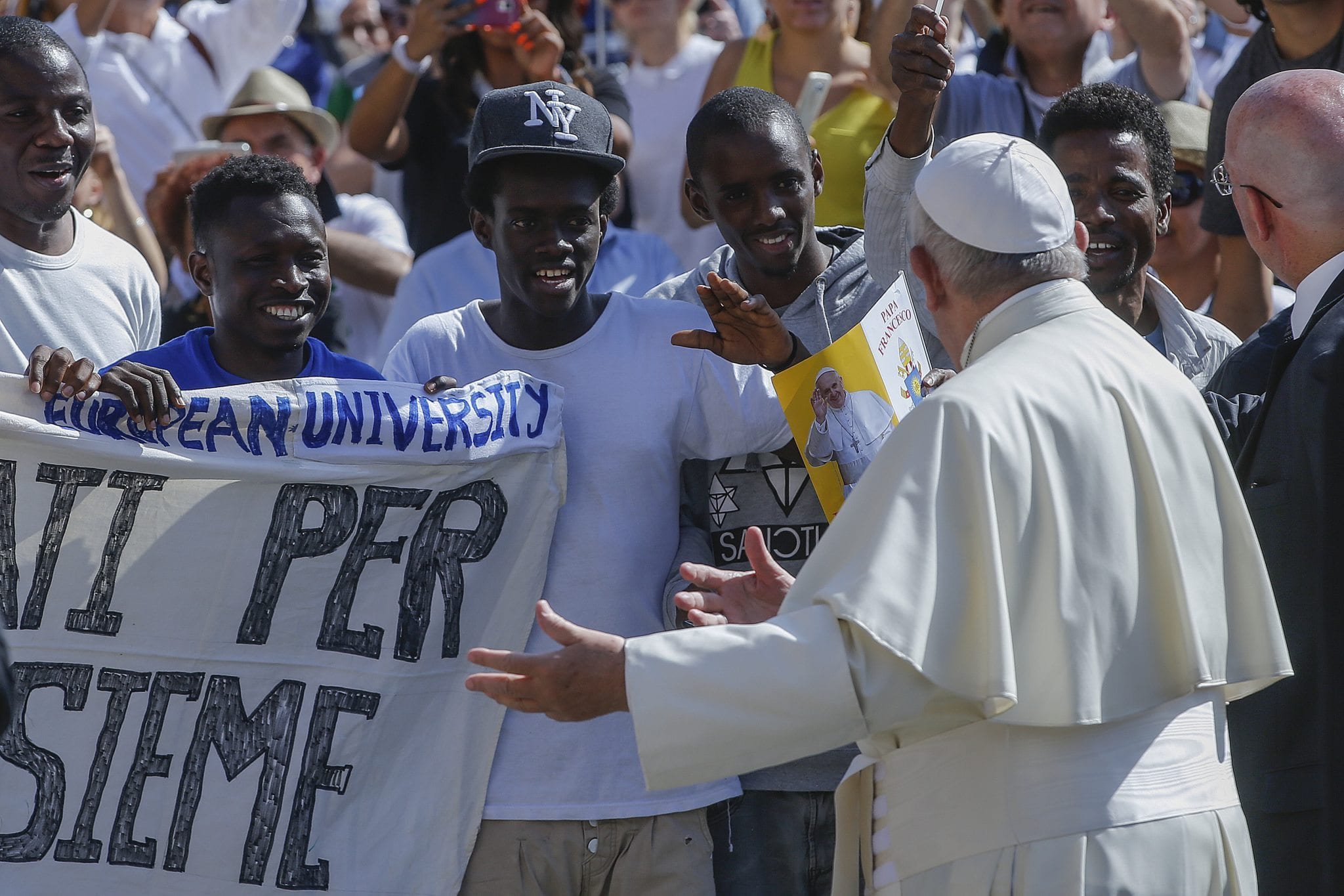 Pope invites refugees to join him on stage for audience | Crux