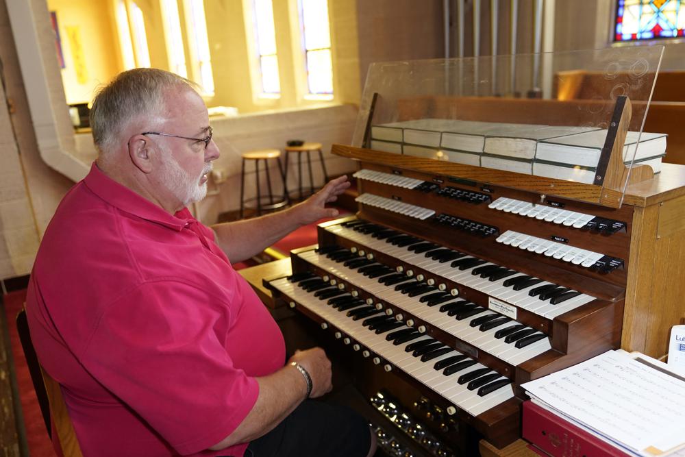 Organ experts try to get the music going again after flood | Crux